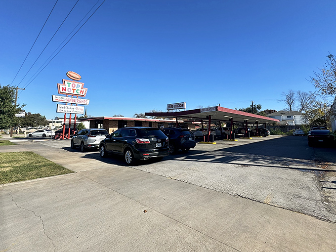That iconic neon sign isn't just retro eye candy&mdash;it's a beacon of burger bliss that's been guiding hungry Austinites to charcoal-grilled paradise for decades.
