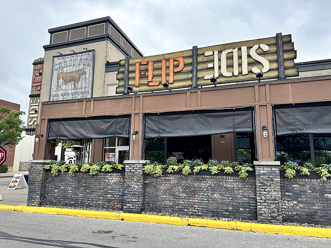 The illuminated Flip Side sign beckons hungry shoppers like a lighthouse guiding ships to safe harbor &ndash; except this harbor is filled with gourmet burgers.