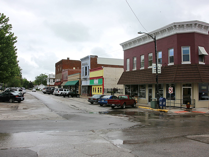 Downtown Bowling Green after a rain shower &ndash; where brick storefronts and puddle reflections create that perfect small-town tableau Norman Rockwell would've loved.