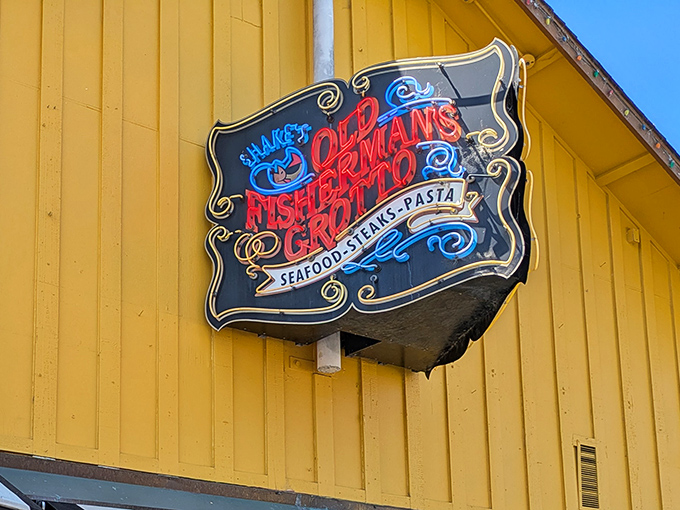 That cheerful yellow exterior with its vintage neon sign isn't just inviting&mdash;it's practically shouting "get in here and eat something delicious already!"