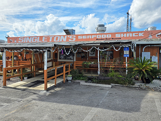 The weathered sign and rustic entrance say it all: authentic Florida seafood awaits inside this unassuming Jacksonville treasure.