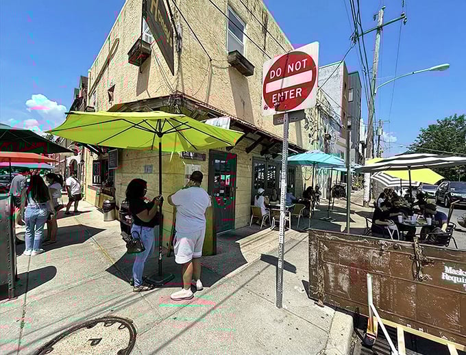 The sunny yellow exterior of Honey's Sit 'n Eat stands out on this Philadelphia corner like a breakfast beacon calling hungry souls home.