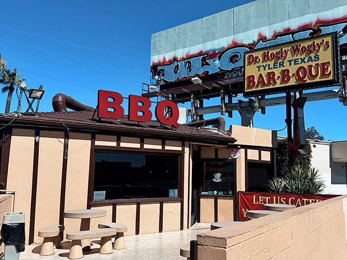 Like a Texas mirage in the California sun, that bold red "BBQ" sign promises authentic smoked delights that would make a Lone Star native weep with joy.