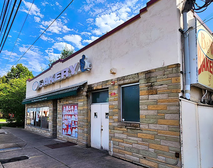 The unassuming storefront of B&W Bakery stands like a temple to carbohydrate worship. No fancy frills, just the promise of legendary baked goods inside.