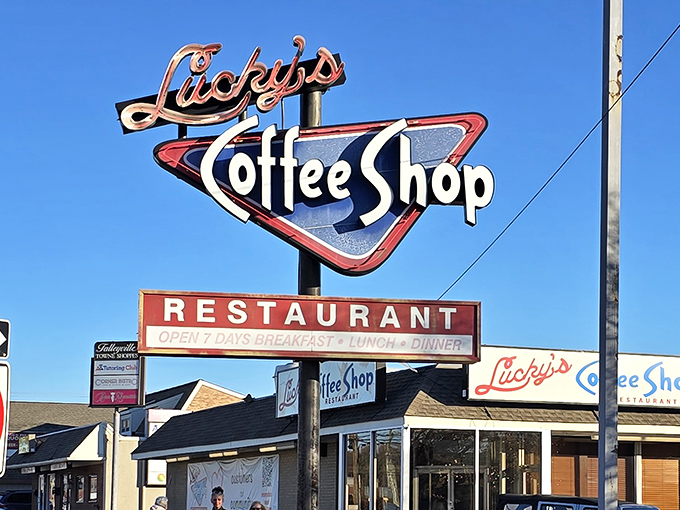 Lucky's iconic neon sign stands like a retro beacon against the Delaware sky, promising breakfast bliss to all who follow its glow.