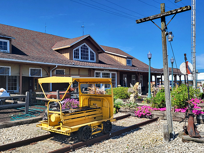 The rustic charm of Back 40 Junction welcomes you like an old friend, complete with vintage railway car and vibrant flowers that say "slow down and stay awhile."