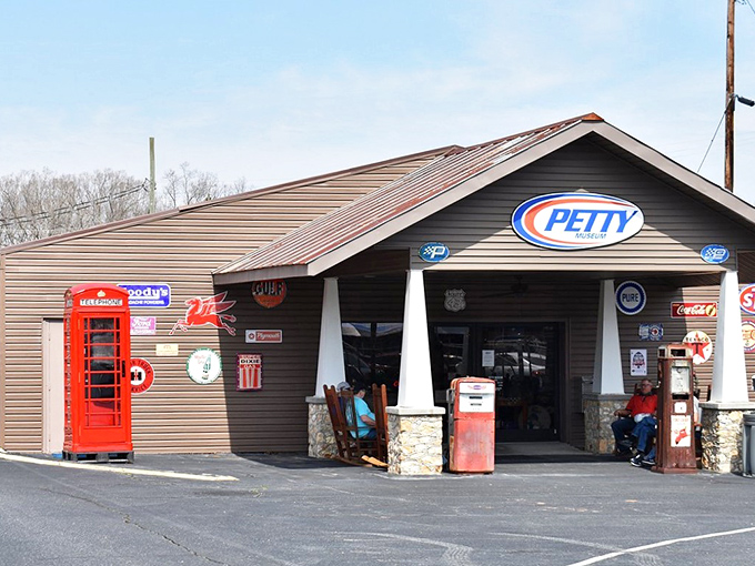 The unassuming entrance to racing royalty. Vintage gas pumps and nostalgic signage welcome you to a temple of speed where legends were born.