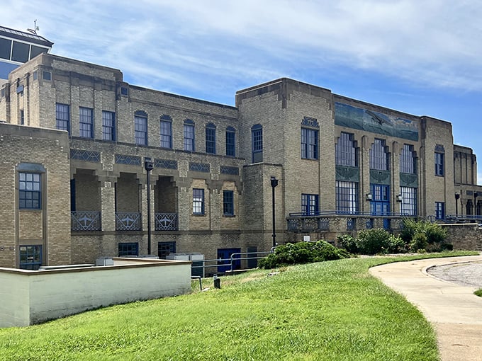 The Art Deco masterpiece that houses the Kansas Aviation Museum stands proudly against the Kansas sky&mdash;a buff-colored time capsule showcasing timeless architectural elegance.