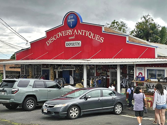 The unmistakable red facade of Discovery Antiques stands like a beacon for treasure hunters, promising adventures in time rather than just shopping.