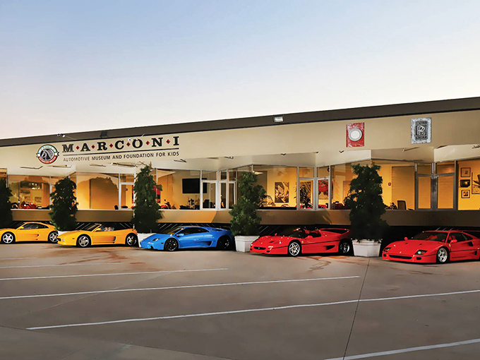 Ferrari red dominates the exterior lineup at Marconi Automotive Museum, where supercars greet you like celebrities at a Hollywood premiere.