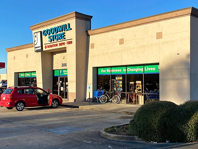 The beige exterior might not scream "retail excitement," but inside this unassuming Goodwill lies a treasure trove that would make Indiana Jones switch careers.