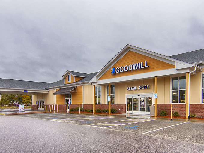 The cheerful yellow exterior of Palmetto Goodwill beckons like a beacon of bargain possibilities, promising treasure hunting adventures within those unassuming walls.