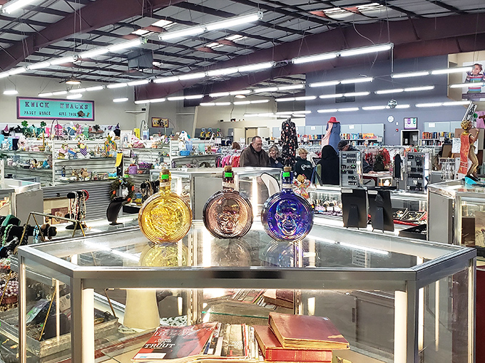 Colorful glass ornaments catch the light in display cases while shoppers browse the vast, organized departments. Every aisle promises new discoveries.