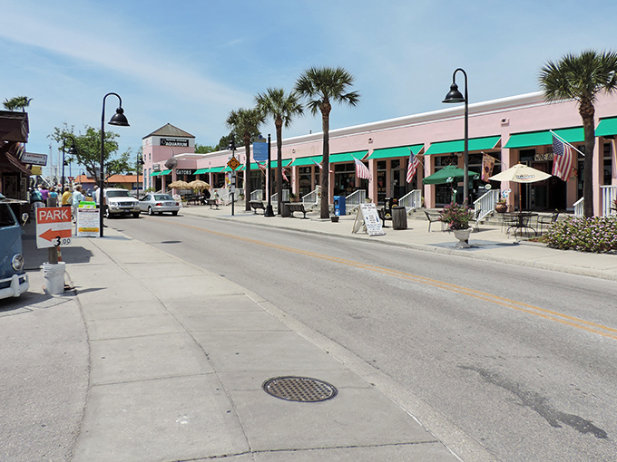 Florida meets the Mediterranean in this pastel paradise. Palm trees sway as shoppers stroll past storefronts that would make Jimmy Buffett feel right at home.