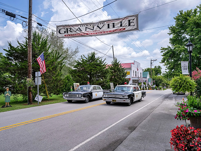 The iconic Granville banner welcomes visitors with vintage police cars parading beneath &ndash; small-town Americana that's not staged for tourists but genuinely lived.