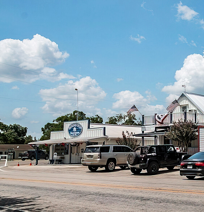 The Round Top Mercantile stands proudly under Texas skies, where locals and visitors alike gather for essentials and friendly conversation.