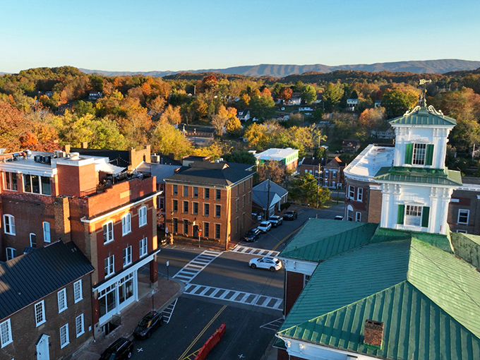 Autumn in Abingdon paints the Blue Ridge Mountains with a palette that would make Bob Ross reach for his happy little brushes. The historic downtown's brick buildings and church steeple stand sentinel against nature's spectacular show.