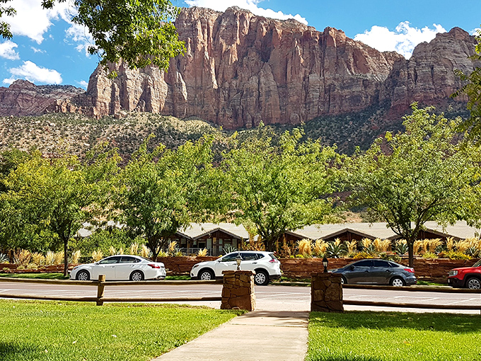 Main Street Springdale unfolds beneath those crimson cliffs like nature's own welcome mat to paradise.
