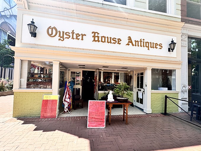 The golden lettering of Oyster House Antiques beckons like a treasure map, promising adventures in time travel right on Charlottesville's historic downtown mall.