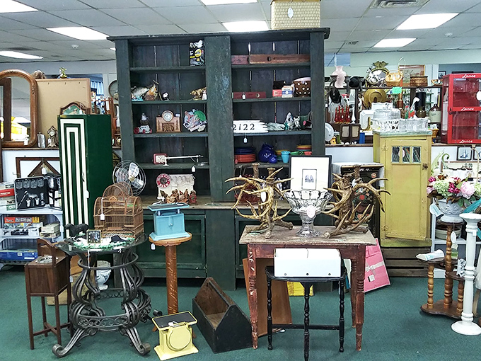 Treasure island alert! This booth showcases the perfect blend of rustic charm and organized chaos that makes antique hunting so addictive.
