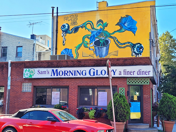 The sunshine-yellow mural above Sam's Morning Glory Diner isn't just eye-catching&mdash;it's practically Philadelphia's most honest breakfast billboard. No filter needed.