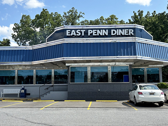 The classic blue-trimmed exterior of East Penn Diner stands proudly against the Pennsylvania sky, like a beacon of comfort food promising delicious treasures within.