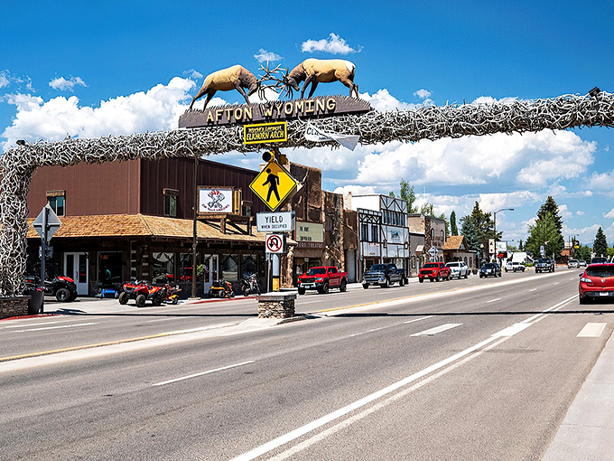 Afton welcomes visitors with its iconic elk antler arch spanning Main Street—where small-town charm meets big mountain views.