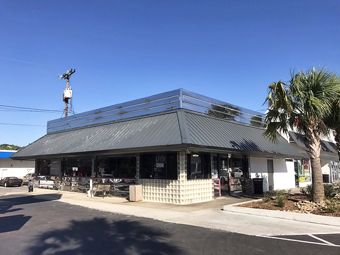 The quintessential American diner exterior: chrome, sunshine, and the promise of a delicious meal waiting inside.
