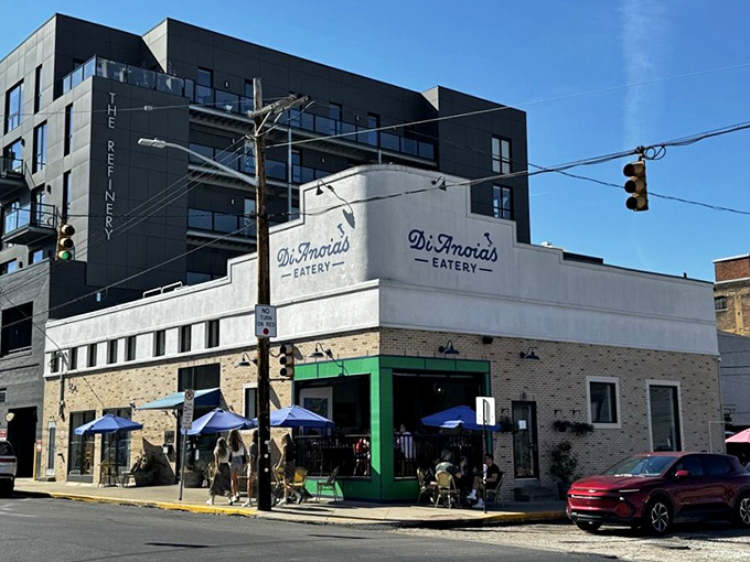 DiAnoia's distinctive white and green corner location in Pittsburgh's Strip District stands out like an Italian flag waving you home to comfort food paradise.