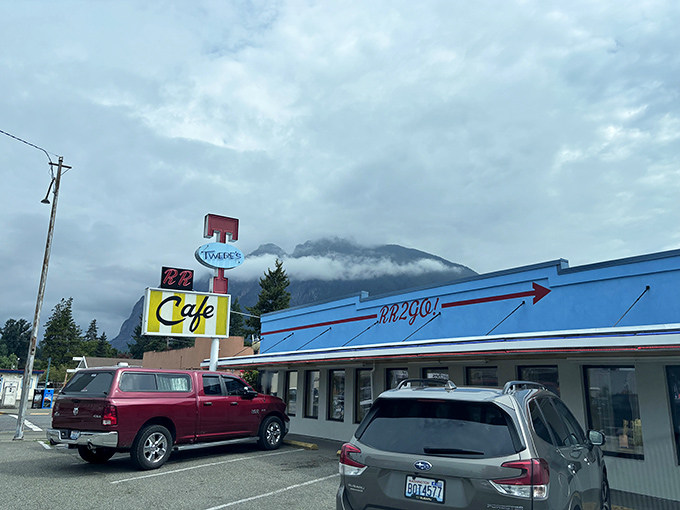 Twede's iconic blue exterior stands sentinel against the dramatic backdrop of Mount Si, promising comfort food and "Twin Peaks" nostalgia in equal measure.