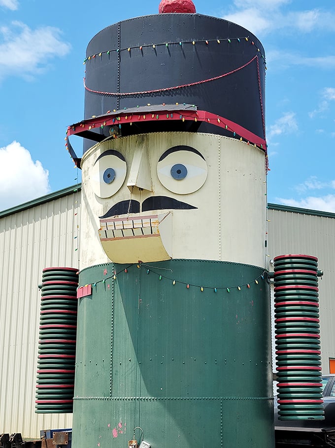 The Giant Nutcracker stands tall against the Virginia sky, like a sentry guarding the gateway to whimsy in Orange County.