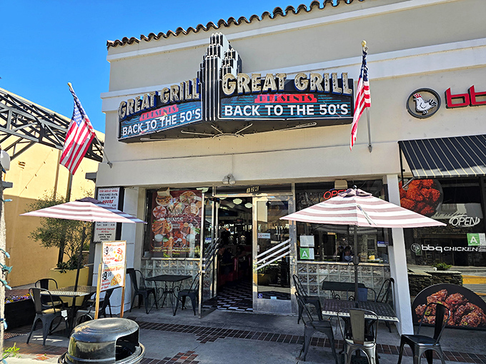 American flags wave proudly outside this Burbank time machine, where nostalgia comes with a side of fries.
