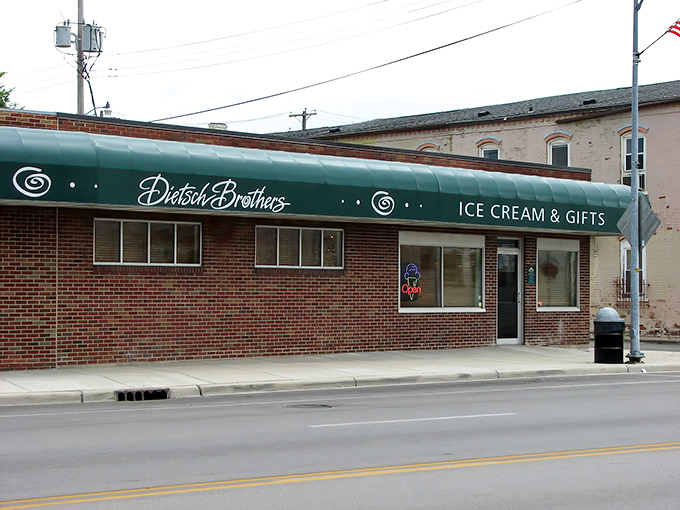 The iconic green awning of Dietsch Brothers stands like a beacon of sweetness on Findlay's Main Cross Street, promising frozen happiness within those brick walls.