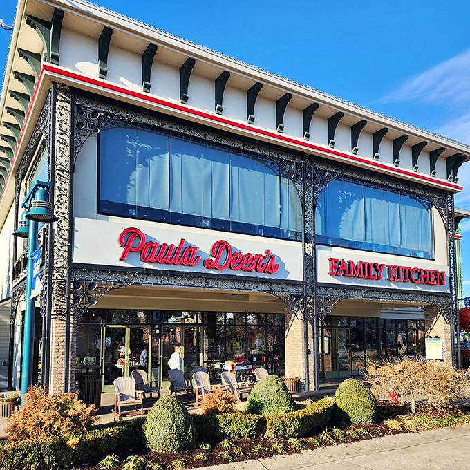 The gleaming facade of Paula Deen's Family Kitchen stands like a beacon of butter-based hope in Pigeon Forge's Island entertainment complex.