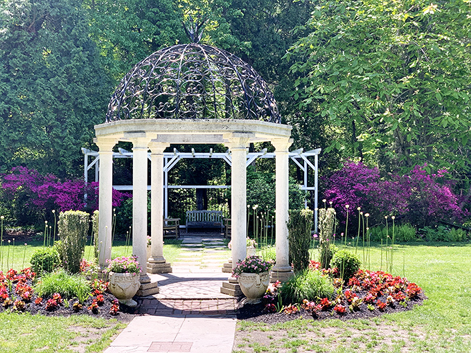 The elegant gazebo stands like a classical temple among vibrant blooms&mdash;proof that New Jersey can do serenity just as well as turnpike traffic.