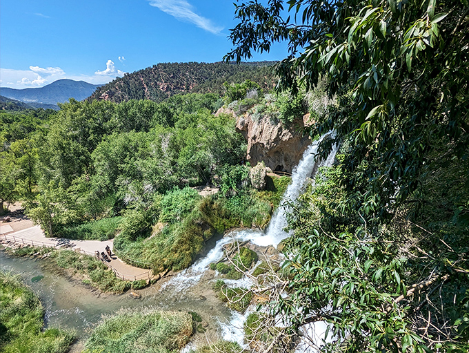 Nature's triple threat: Rifle Falls' magnificent cascade creates its own microclimate, turning what should be semi-arid Colorado into a lush, misty paradise.