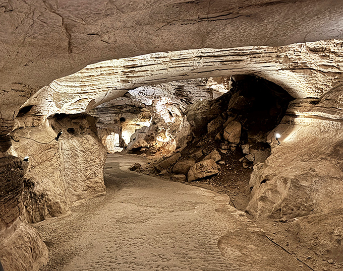 Nature's own sculpture gallery: smooth limestone passages at Longhorn Cavern reveal millions of years of patient artistry beneath Texas soil.