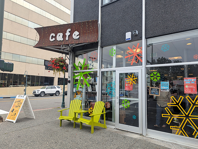 Snow City's inviting entrance with cheerful lime green chairs welcomes hungry Alaskans willing to brave any weather for legendary breakfast.