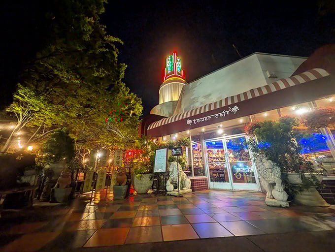 Tower Cafe's iconic neon-lit exterior beckons like a lighthouse for the hungry, promising culinary adventures that begin the moment you spot that vintage tower.