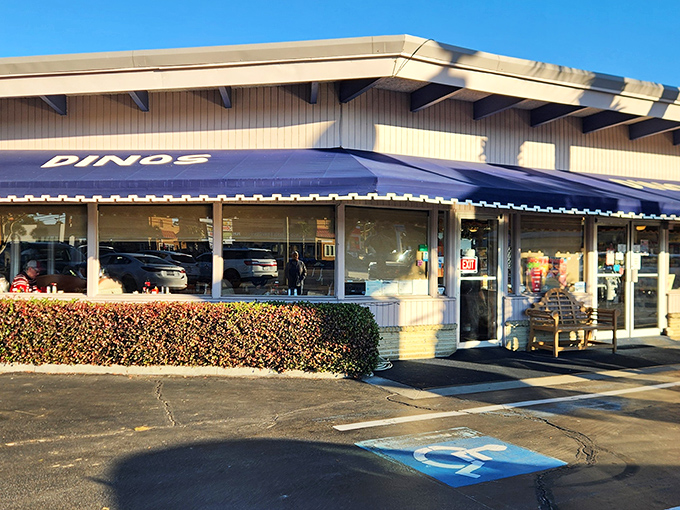The blue awning beckons like a breakfast lighthouse on the North Myrtle Beach horizon. Dino's unpretentious exterior promises pancake paradise within.