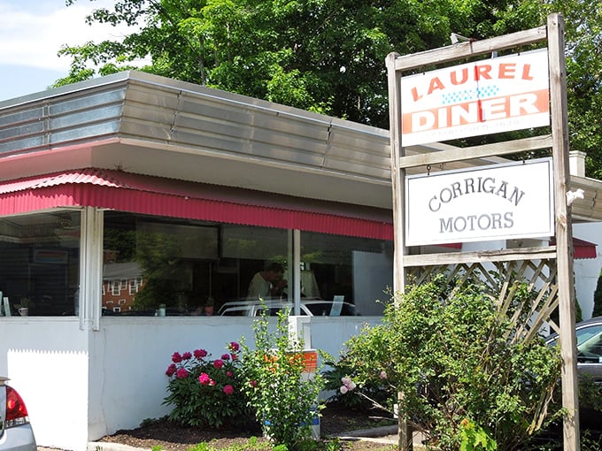 The classic red and white Laurel Diner sign stands like a beacon of breakfast hope, promising comfort food salvation to hungry Southbury locals.