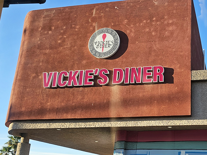 That iconic sign with its Greek key border isn't just announcing a restaurant&mdash;it's broadcasting a time portal to when diners were the cornerstone of American social life.