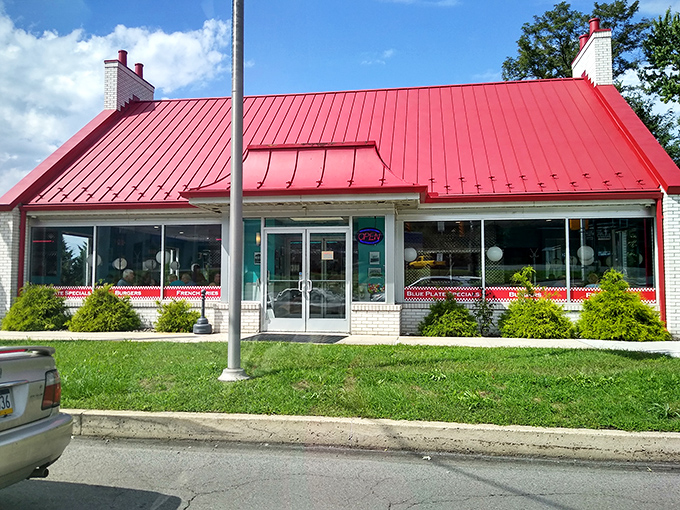 The iconic red roof of Pottsville Diner stands out like a beacon for hungry travelers, promising retro charm and comfort food that delivers.
