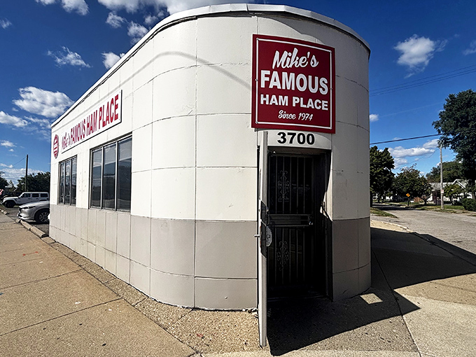 The unassuming white exterior of Mike's Famous Ham Place stands like a culinary lighthouse in Detroit, promising ham salvation to those in the know.