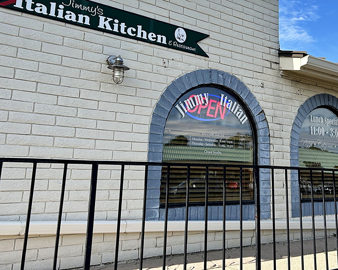 The unassuming exterior of Jimmy's Italian Kitchen proves once again that the best Italian food often hides behind the simplest facades. Culinary treasures await inside!