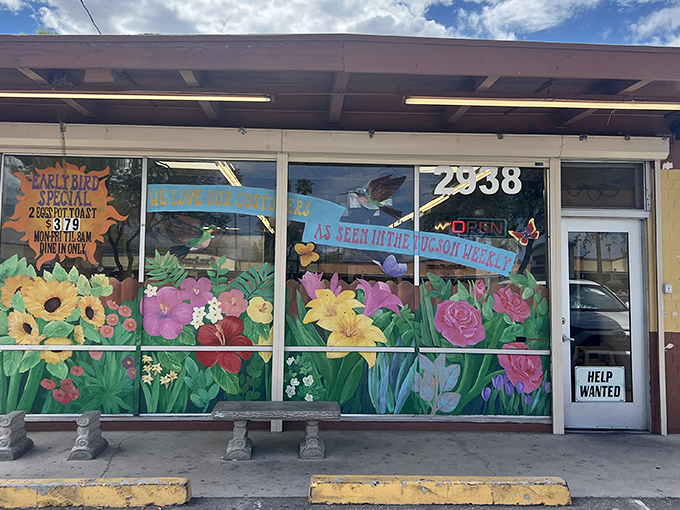 The cheerful yellow exterior of Bobo's, with its hand-painted flower murals, feels like stumbling upon a secret garden that happens to serve incredible breakfast.
