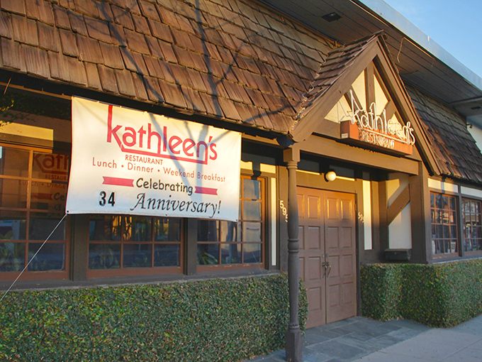 Kathleen's rustic wooden shingle exterior beckons like an old friend, promising comfort and culinary delights behind those welcoming doors.