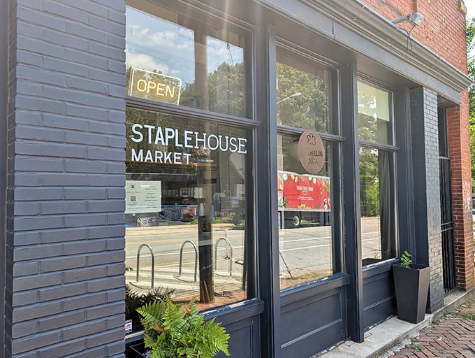 The unassuming blue-gray facade of Staplehouse Market belies the culinary wonderland waiting inside this Atlanta gem.