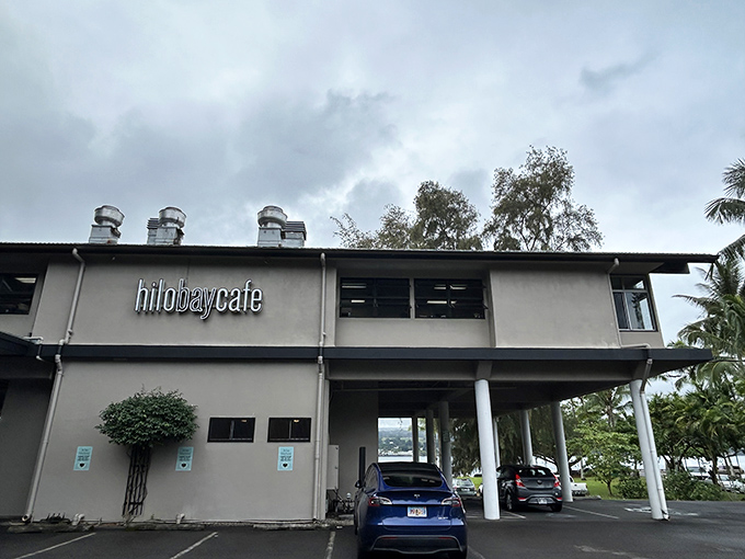 The unassuming exterior of Hilo Bay Cafe belies the culinary magic happening inside. Like finding a Michelin star in your neighbor's garage.