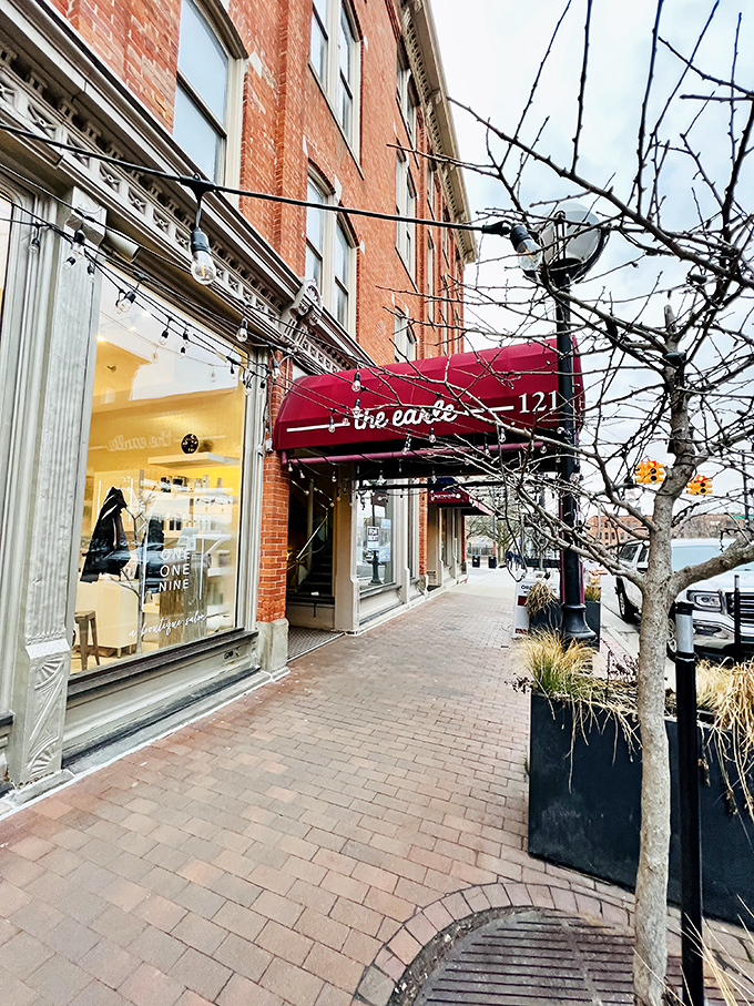 Look for the distinctive burgundy awning marking the entrance to this underground culinary haven&mdash;your gateway to European flavors.